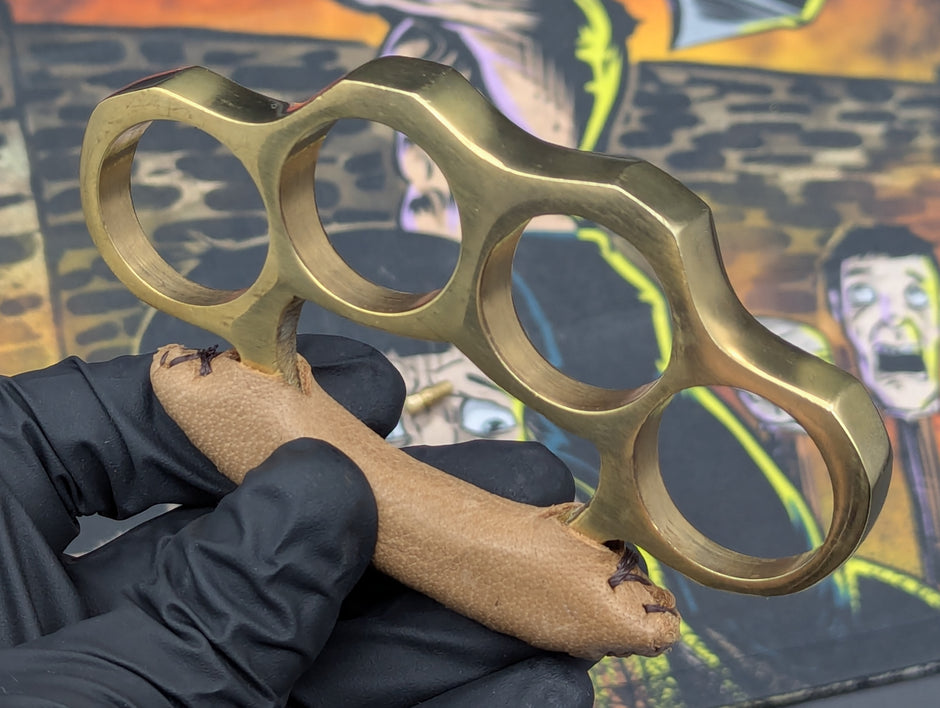 BRASS KNUCKLES – LIGHTNING OTF KNIVES