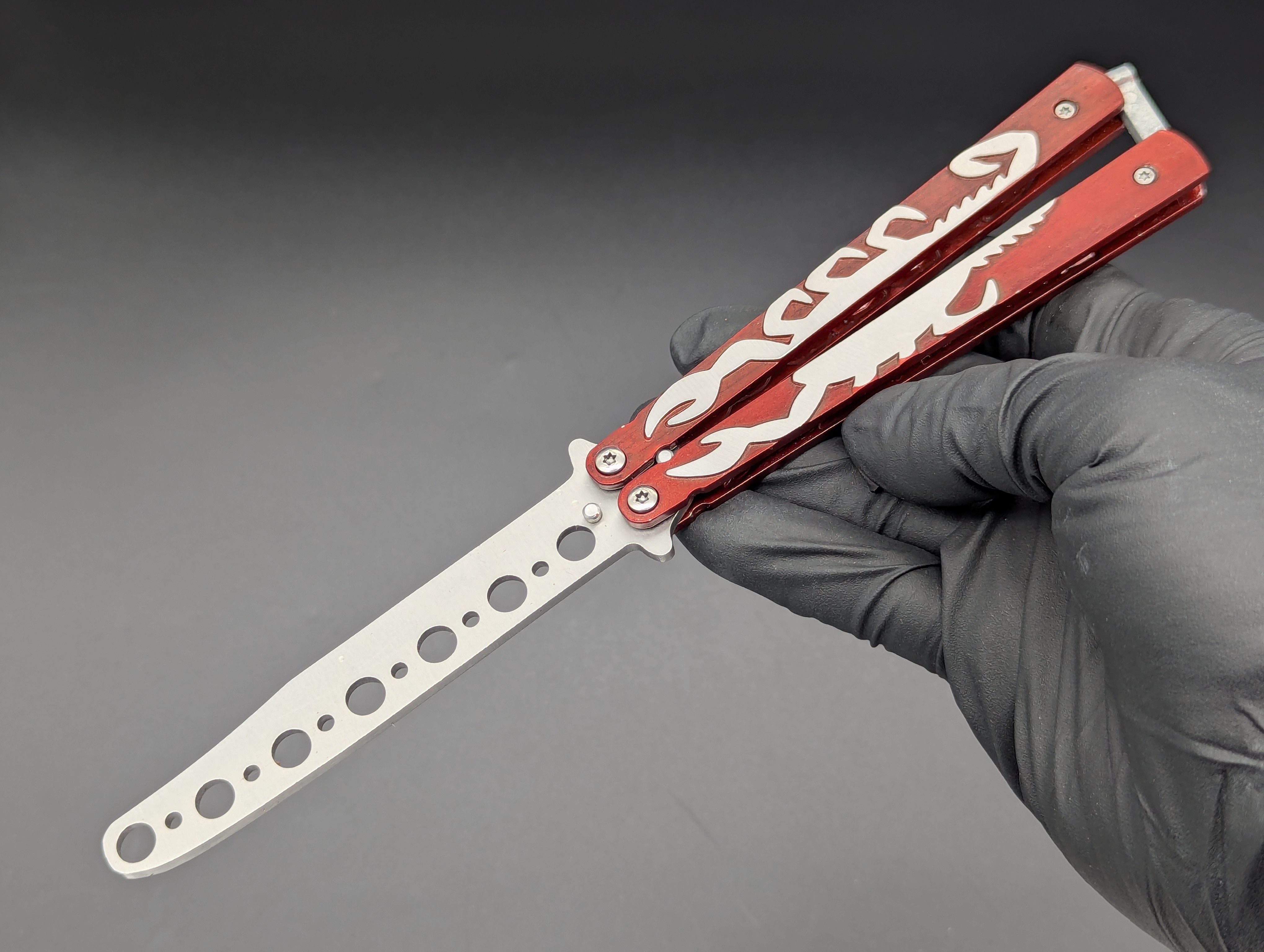 Red Scorpion Balisong Trainer – LIGHTNING OTF KNIVES
