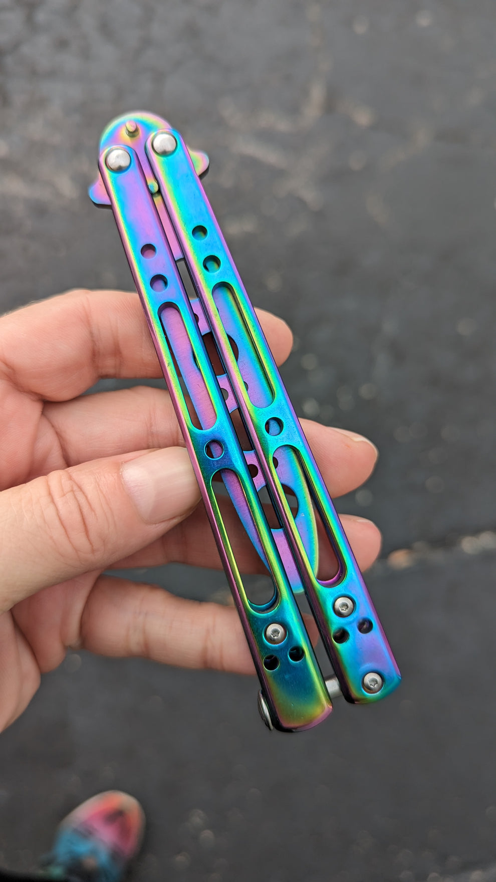 RAINBOW Ti SKELETONIZED BALISONG TRAINER – LIGHTNING OTF KNIVES